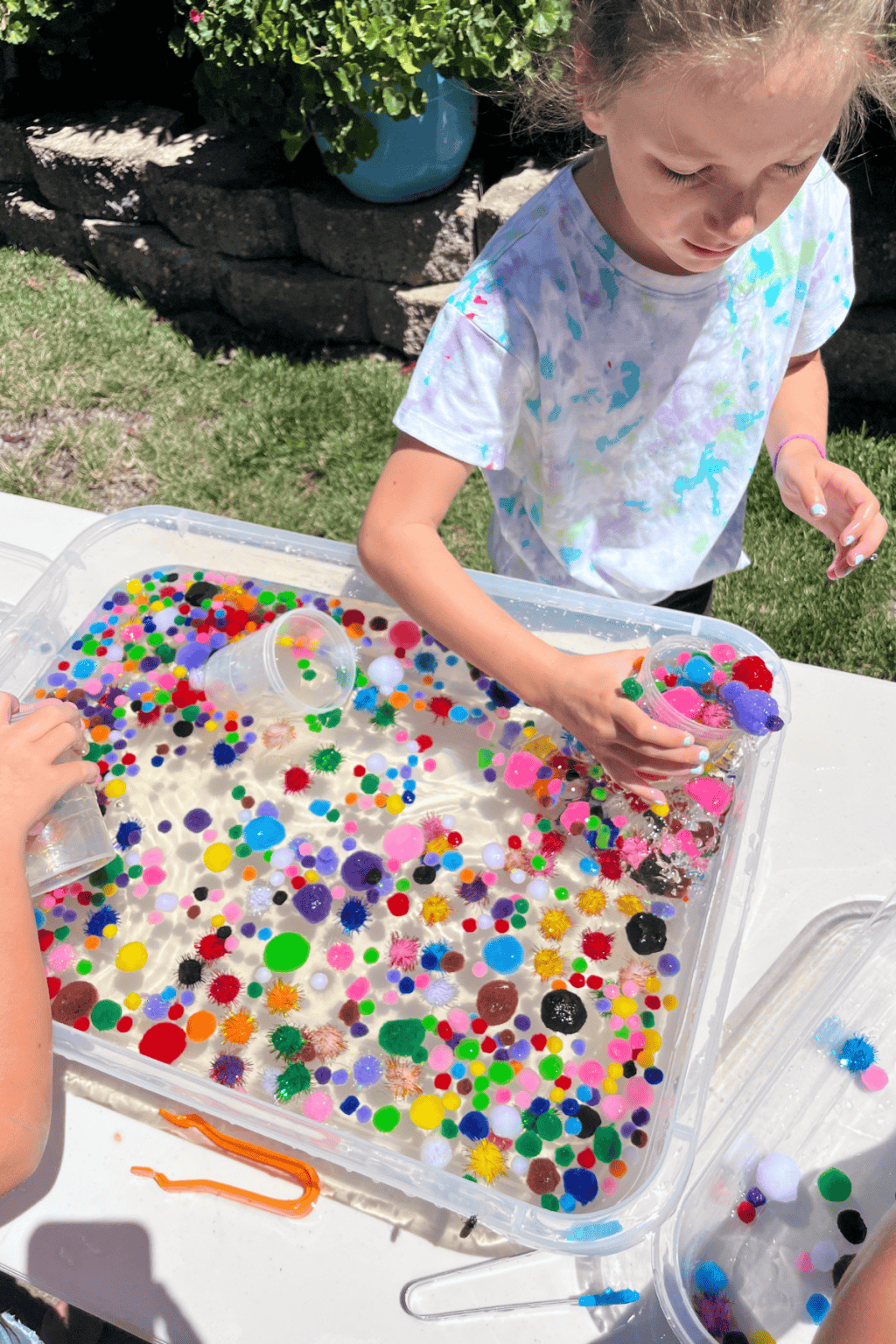 Pom-Pom Water Table Sensory Activity - Friends Art Lab